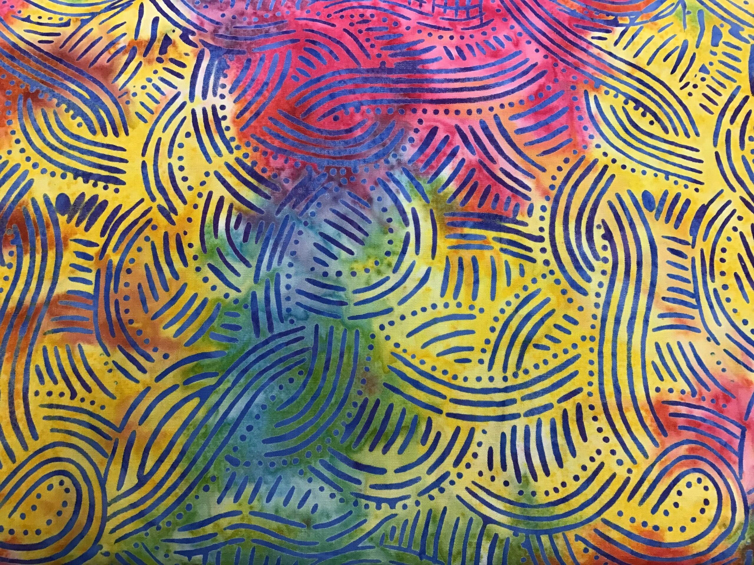 Batik Waves Multi Red Yellow Blue fabric - Quilters Den